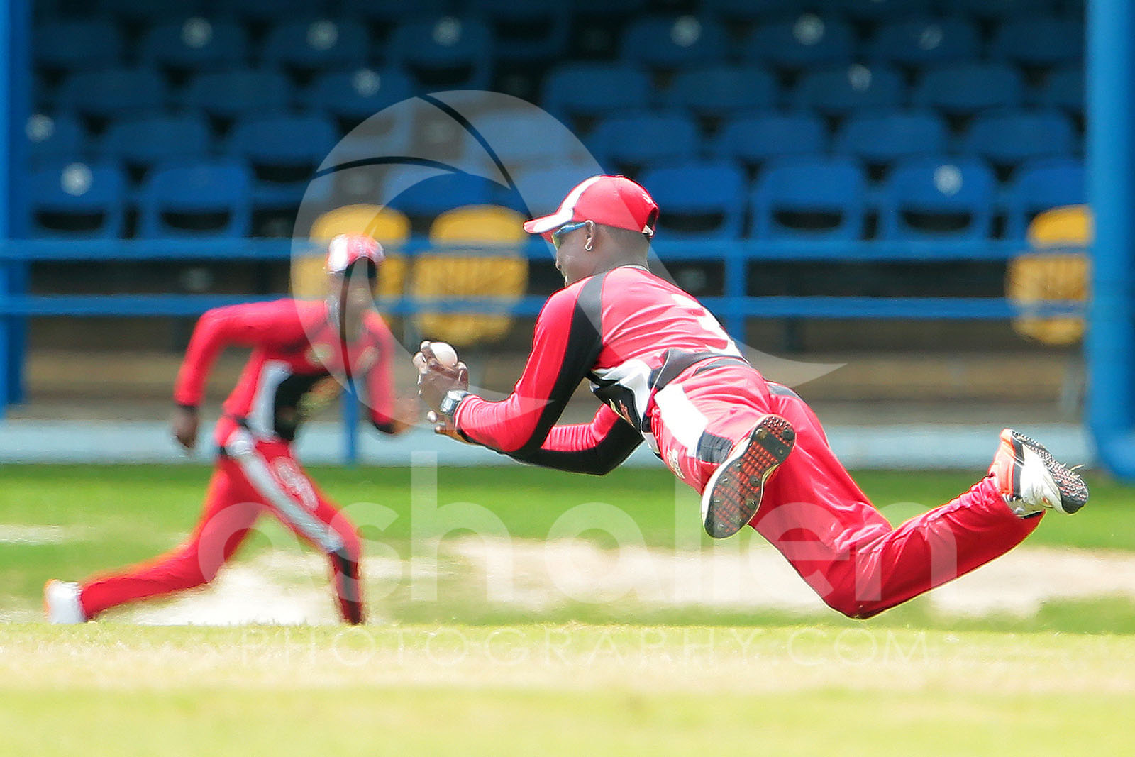 Jason Mohammed is airborne as he catches Roston Chase - Ash Allen ...